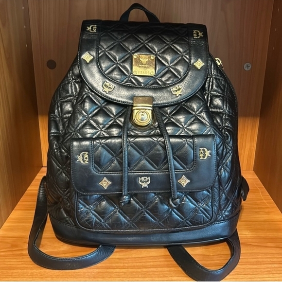 MCM | Bags | Mcm Black Quilted Backpack With Gold Details In Excellent ...